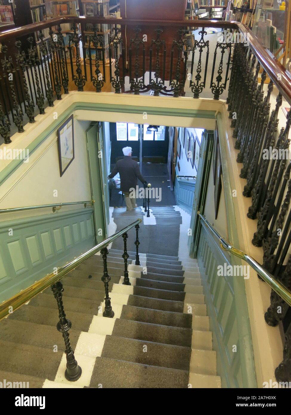 Male figure at the foot of the ornate staircase after visiting the ...