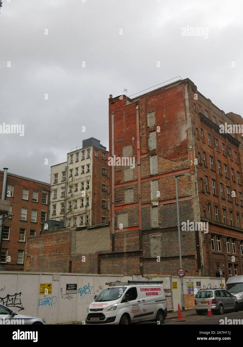 With one block demolished, the steel support girders, bricked-up ...