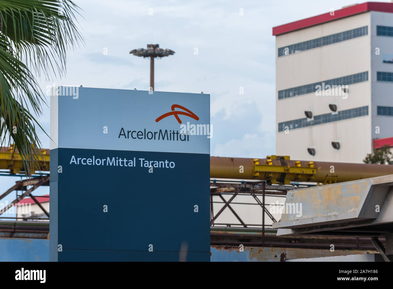 ArcelorMittal steel mill entrance in Taranto, Italy Stock Photo - Alamy