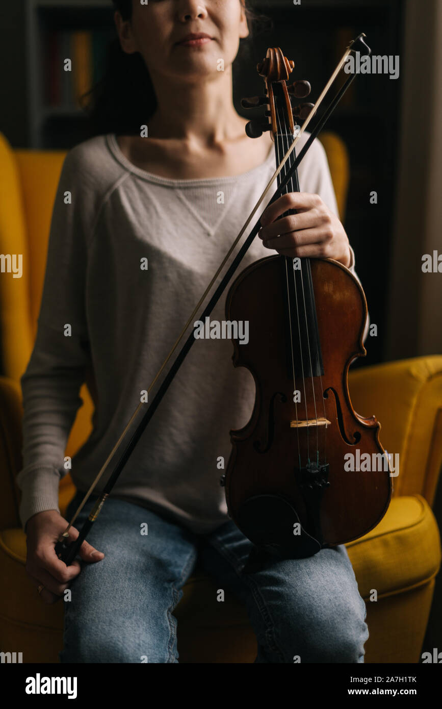 Asian girl playing cello hi-res stock photography and images - Alamy
