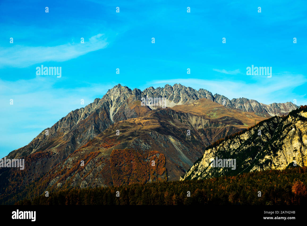 The peaks of the Alps are always spectacular with their forests and ...