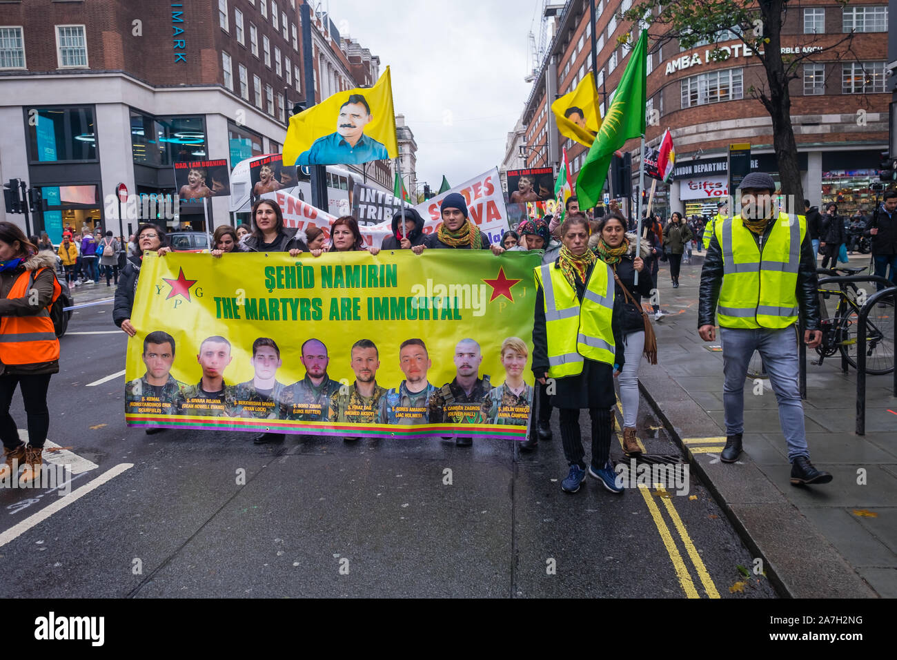 London, UK. 2nd November 2019. People hold a banner showing those who ...