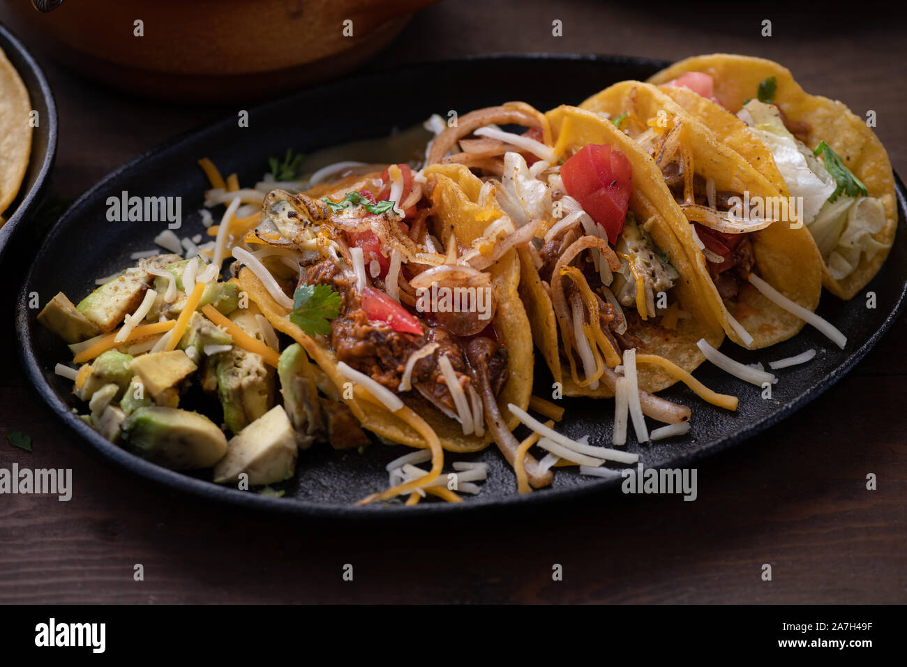 Mini street vegetarian corn tacos and side filling: tomatoes, queso ...