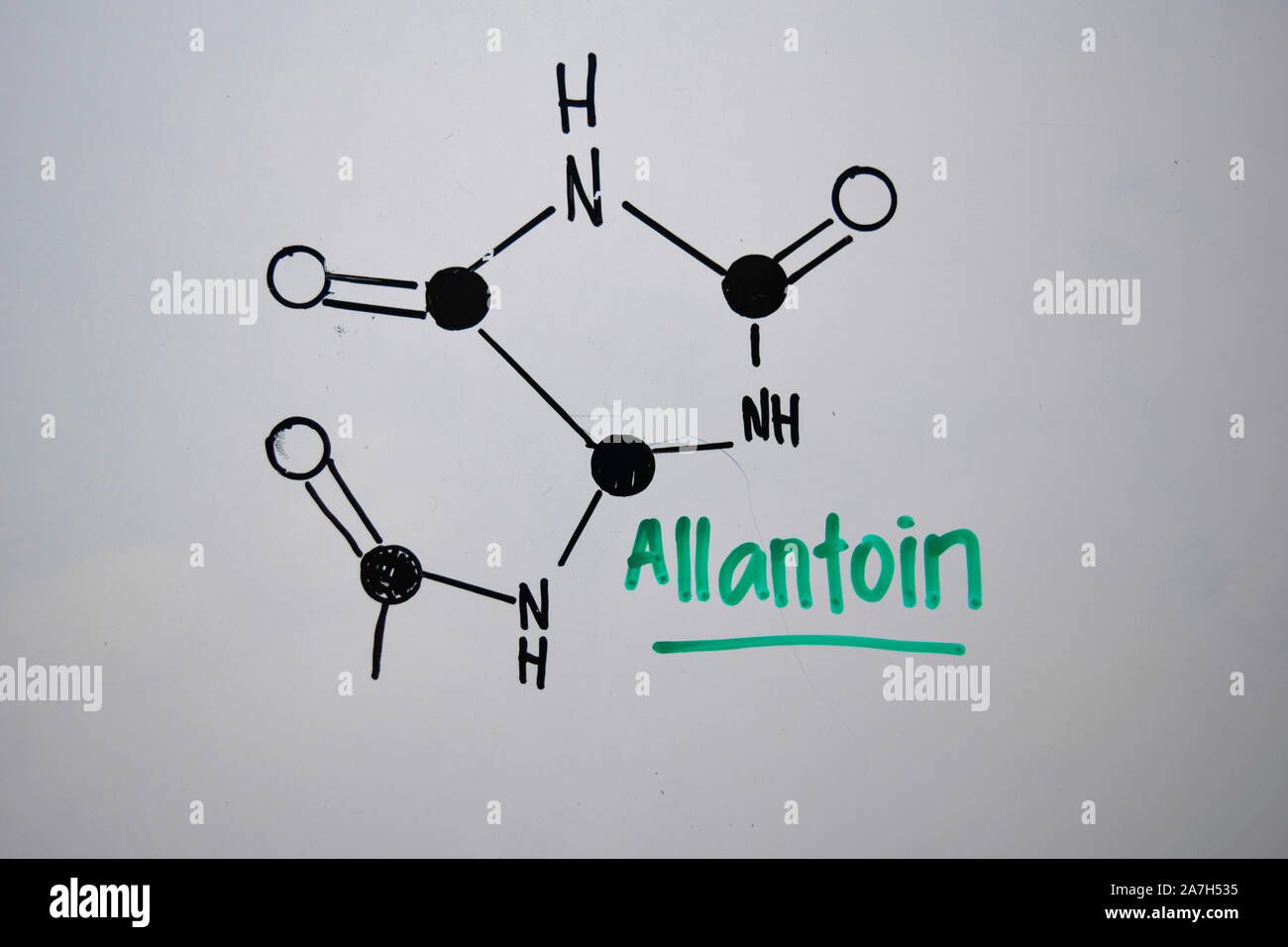 Allantoin or called 5-uredohydantoin molecule write on the white board ...