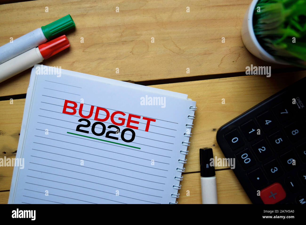 Budget 2020 write on the book with wooden table background Stock Photo ...