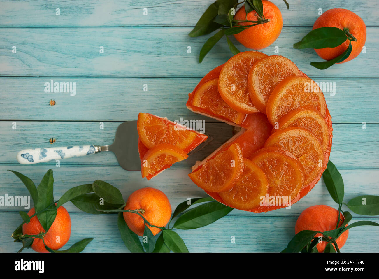 Top view of a cold homemade orange pie with candied orange on the ...