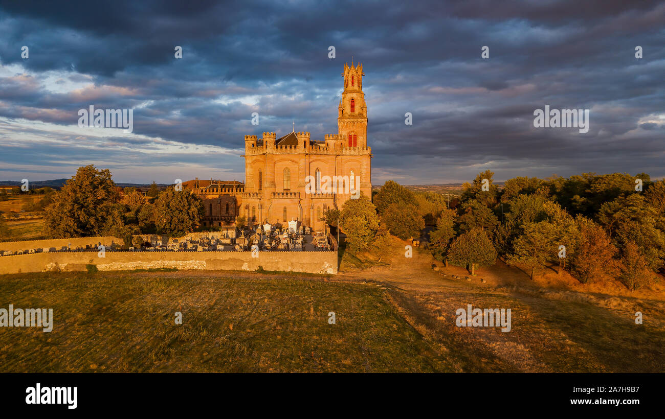 Church Notre Dame de la Dreche outside Albi city with dramatic clouds ...
