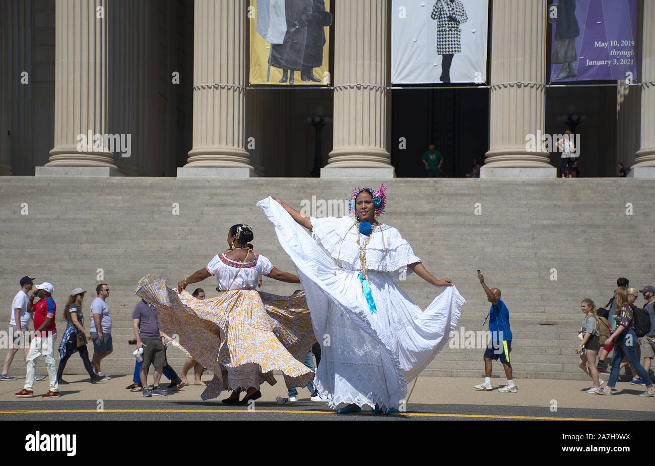 Women in flowing traditional dress dancing in Fiesta DC parade 2010 ...