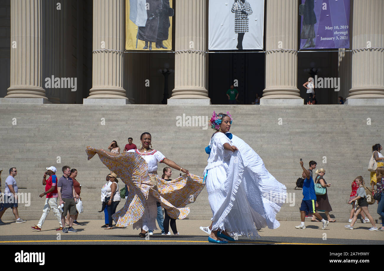 Women in flowing traditional dress dancing in Fiesta DC parade 2010 ...
