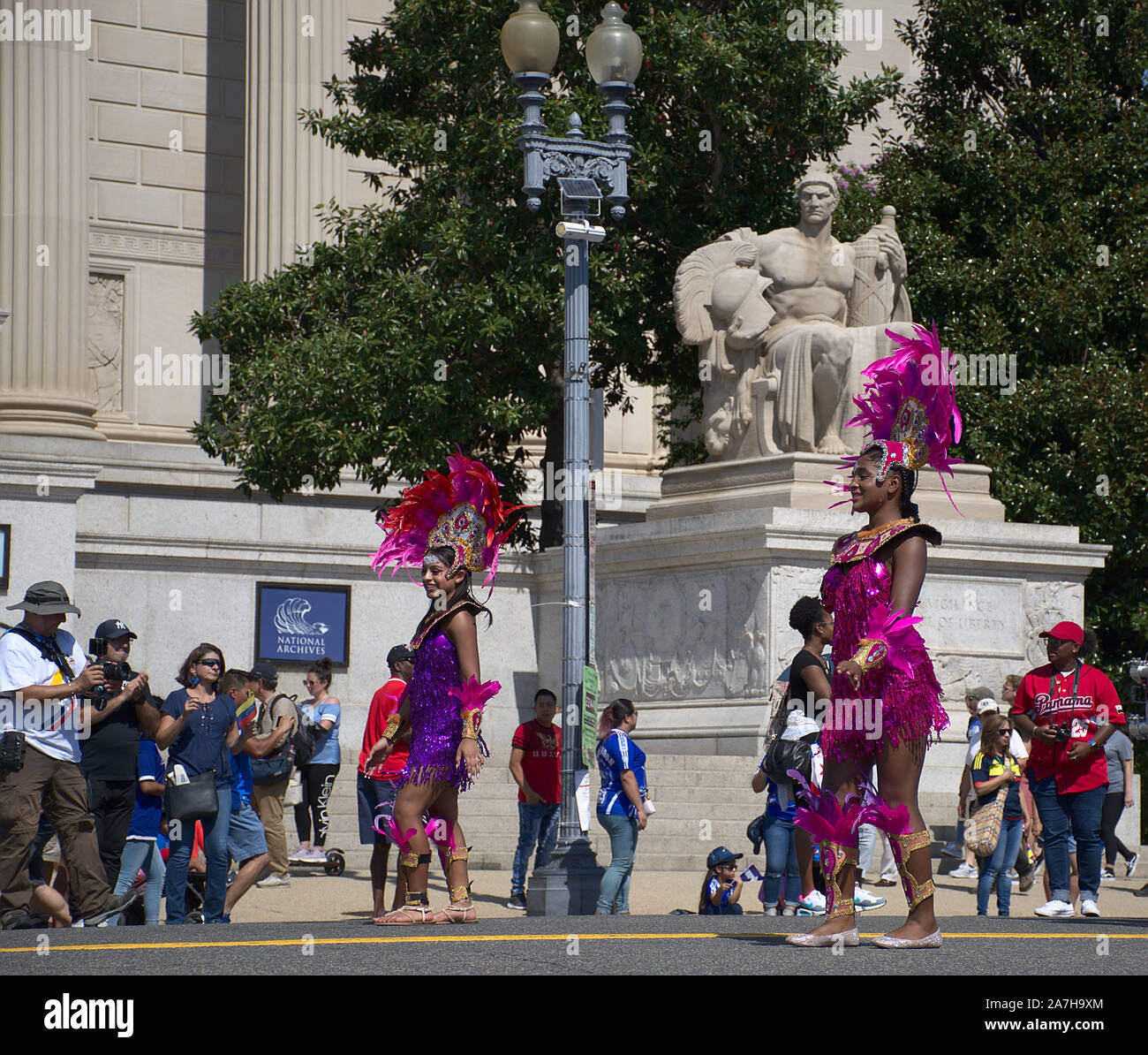 Women in costumes dancing in Fiesta DC parade 2019 Stock Photo - Alamy