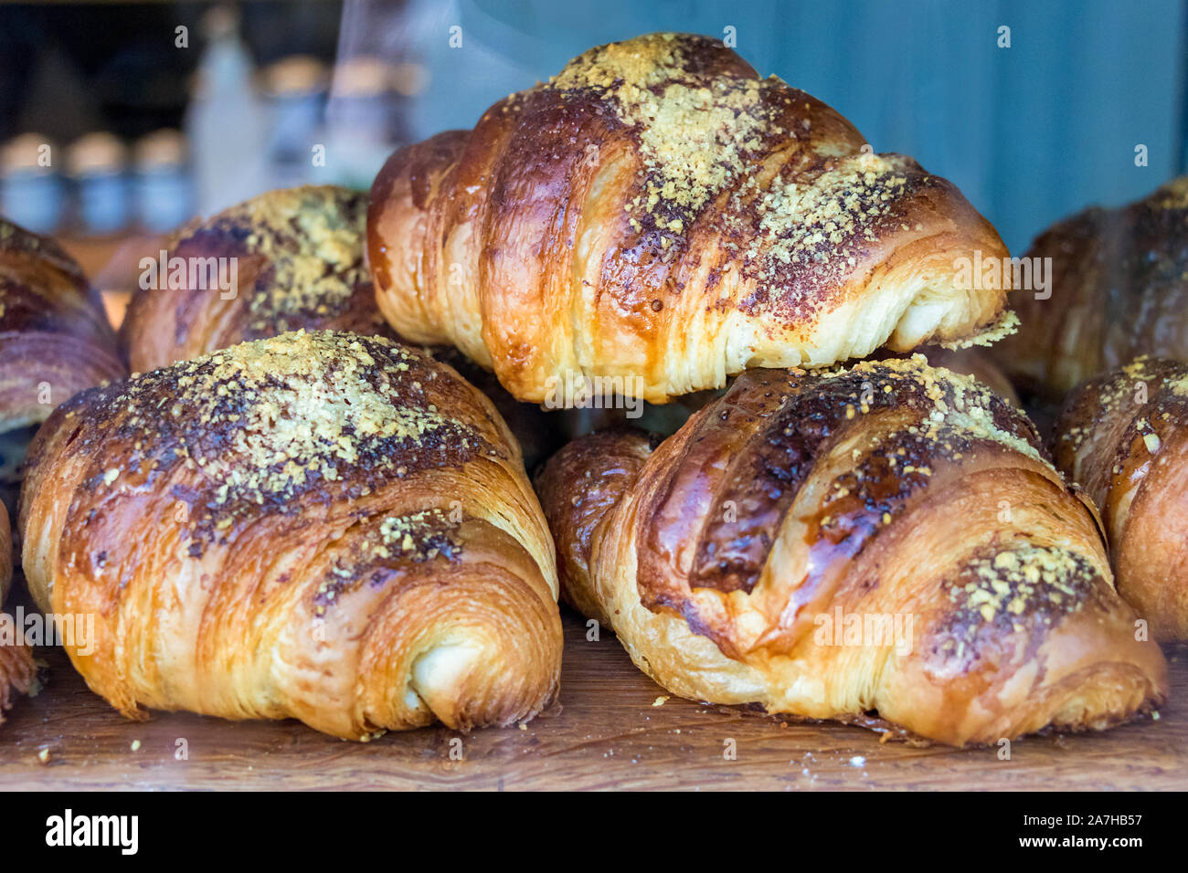 Close-up of french croissants just baked placed on the storefront of a ...