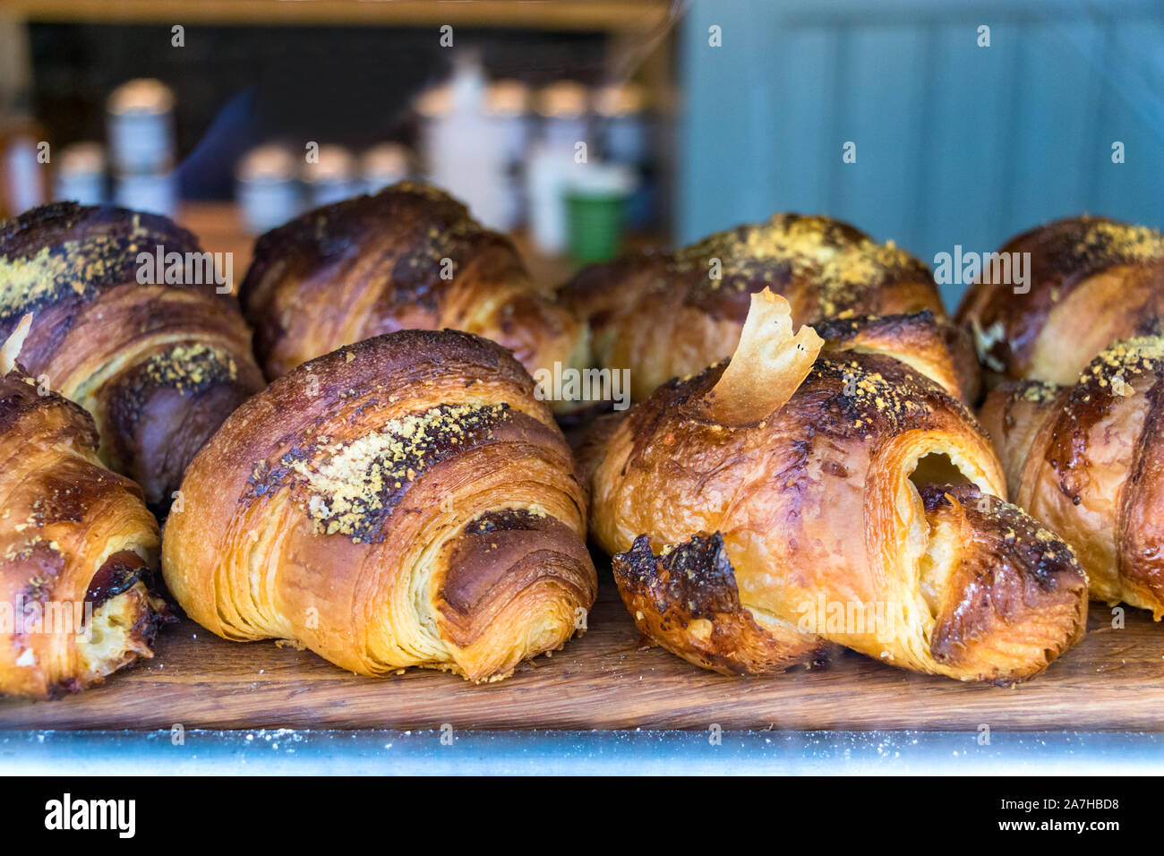 Close-up of french croissants just baked placed on the storefront of a ...