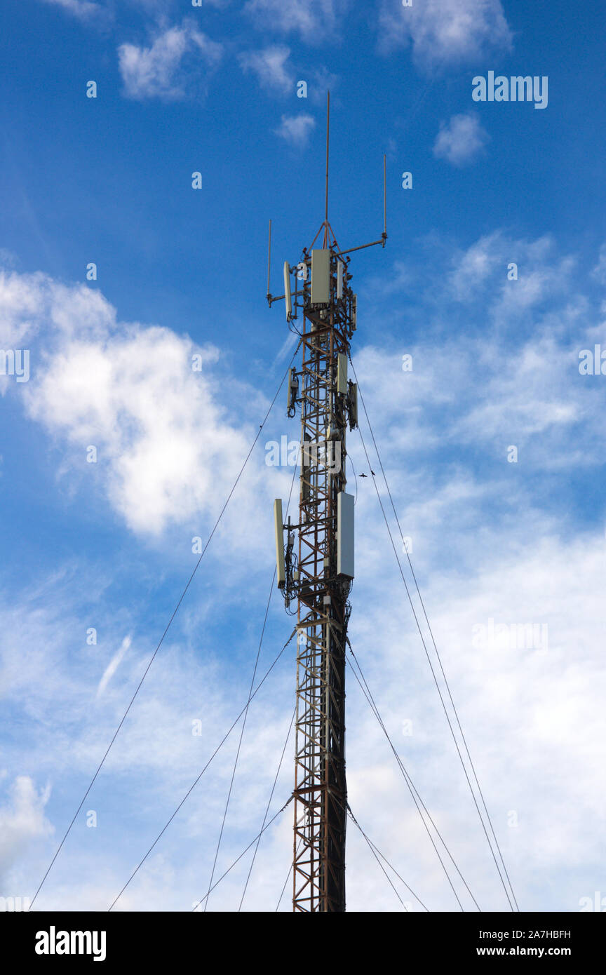 Signal transmitting antenna for mobile networks isolated on the blue ...