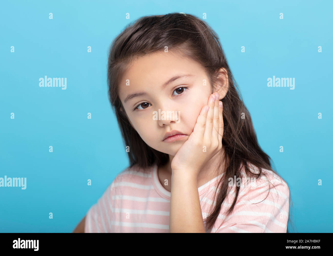 closeup little girl with toothache Stock Photo - Alamy