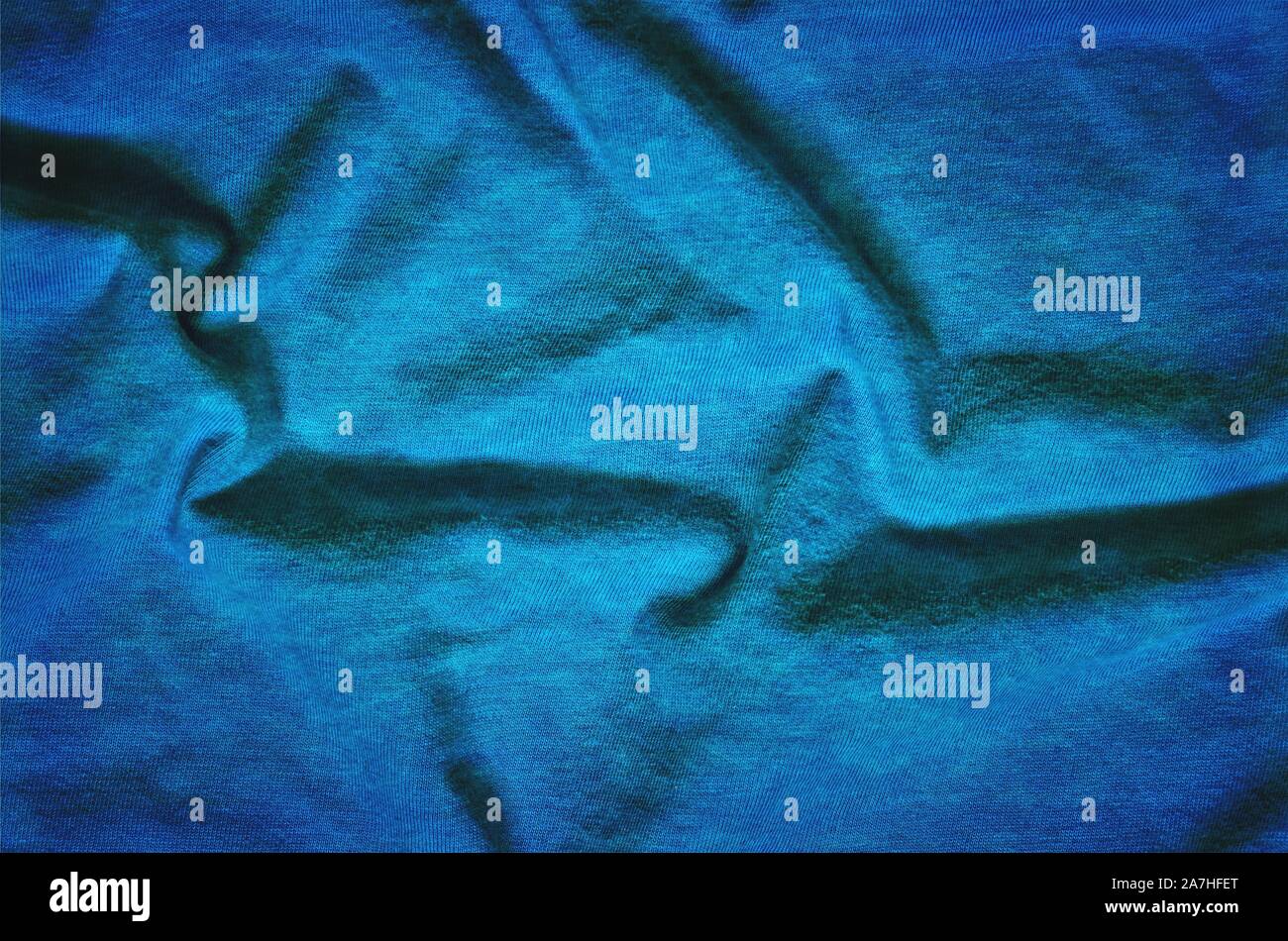 Interesting clothing background. Blue texture of wrinkled material ...
