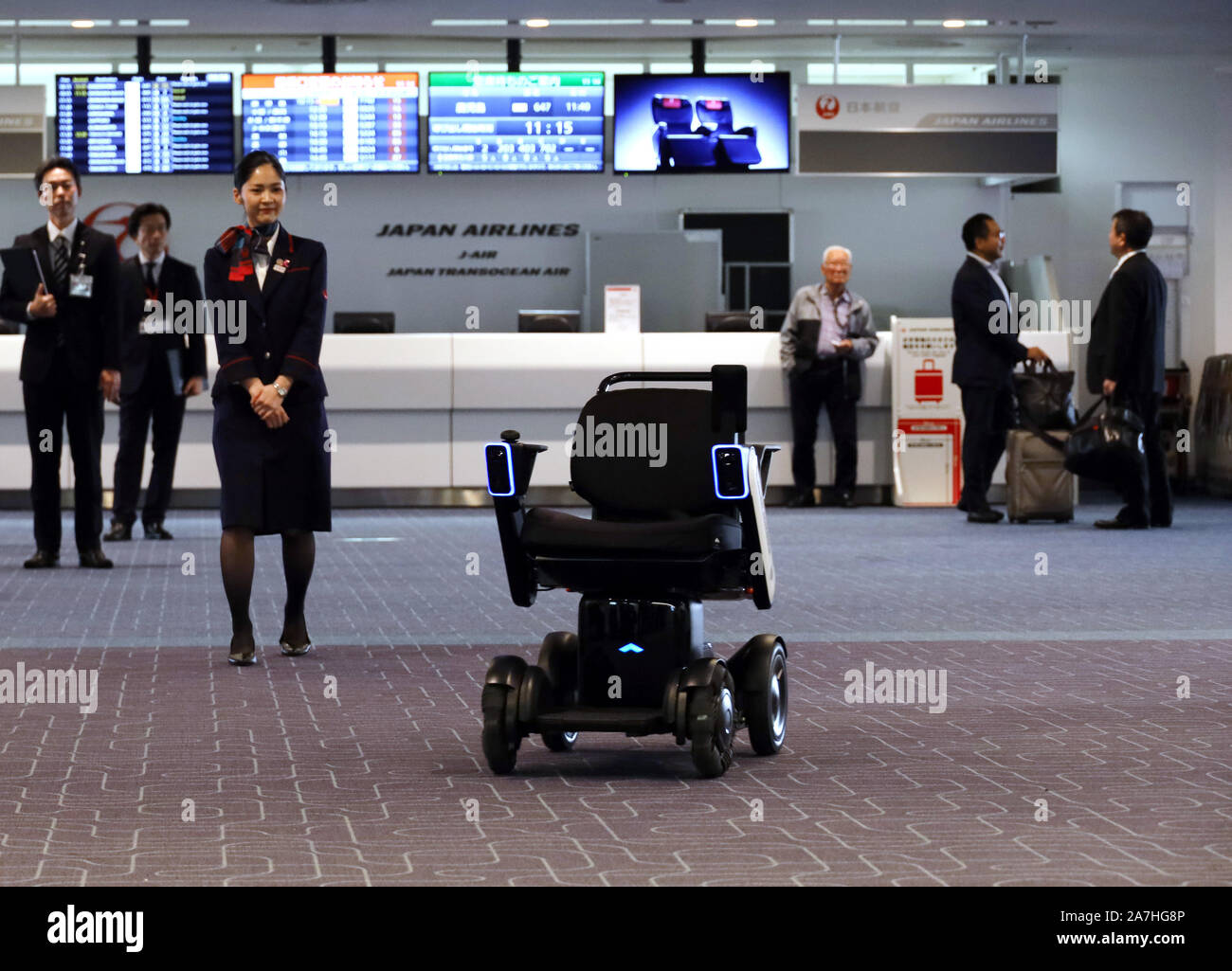 Tokyo, Japan. 2nd Nov, 2019. An electric vehicle WHILL returns from a ...