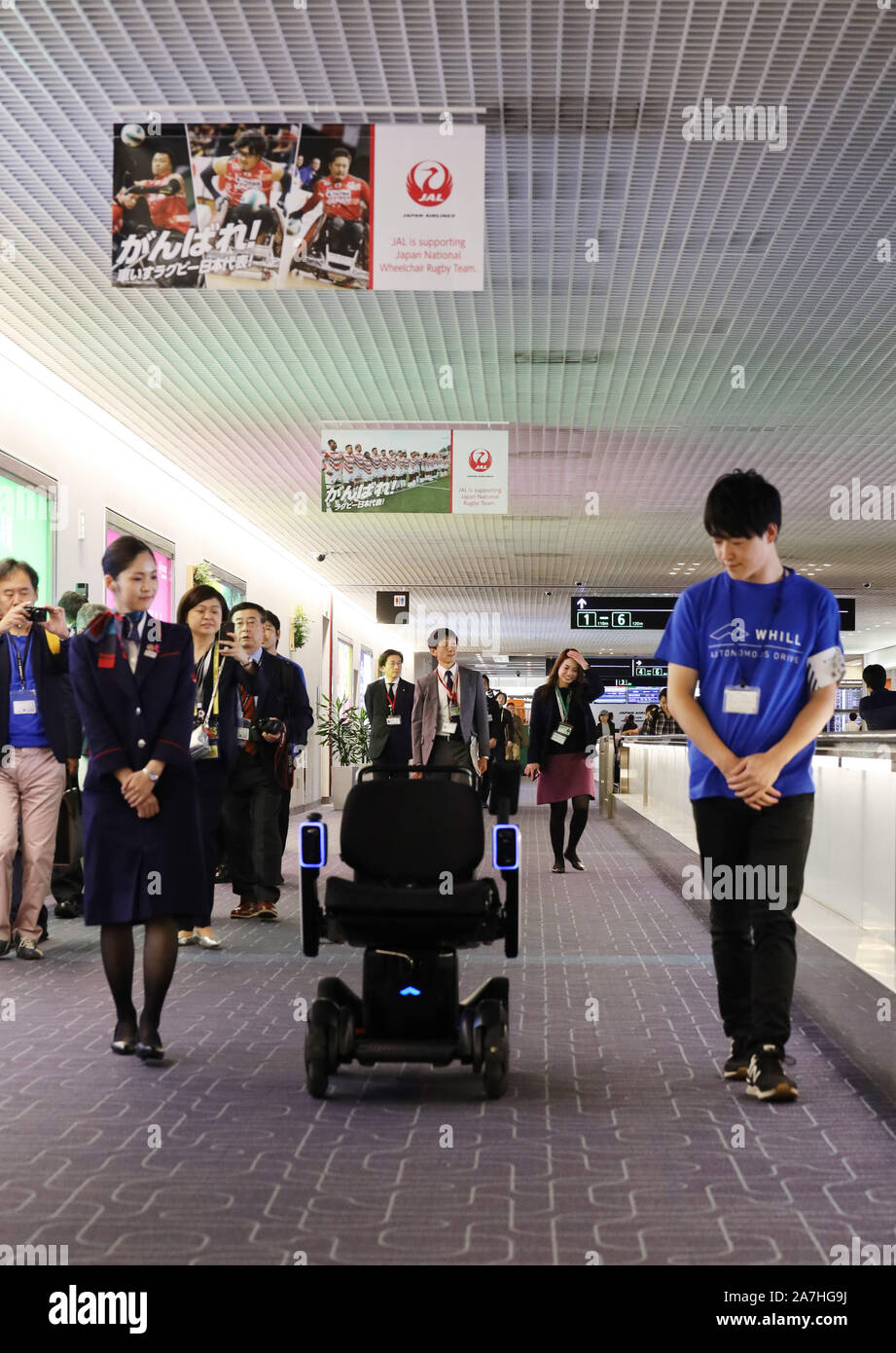 Tokyo, Japan. 2nd Nov, 2019. An electric vehicle WHILL returns from a ...