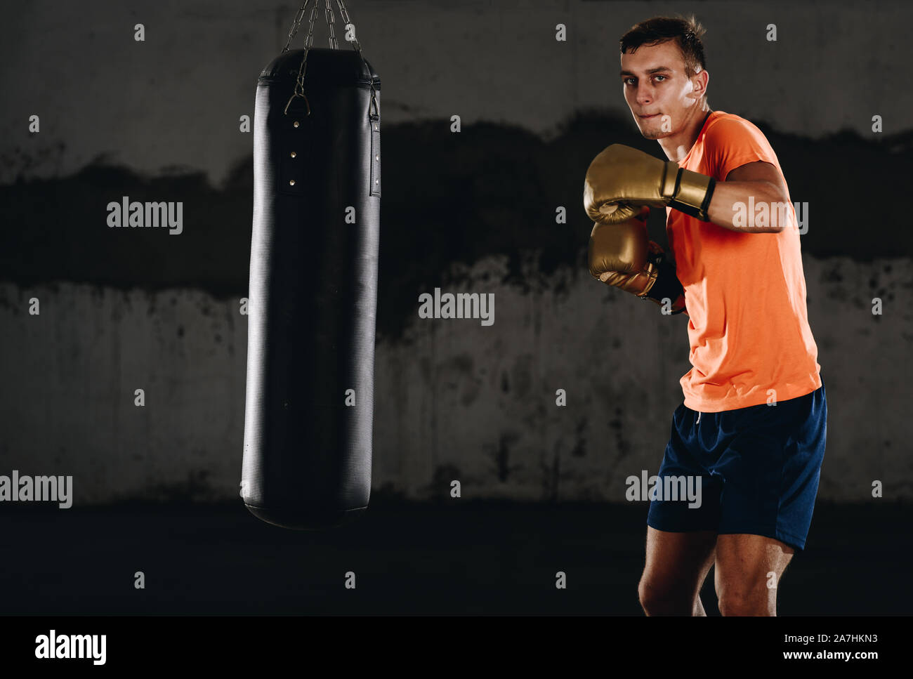 Big boxing punching bag in hi-res stock photography and images - Alamy