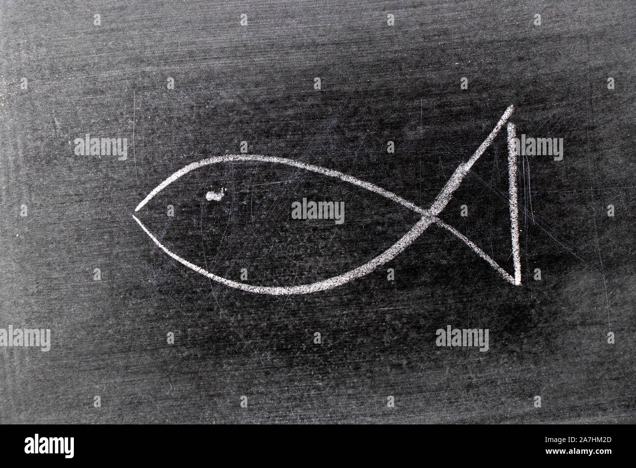White chalk drawing in fish shape on blackboard background Stock Photo ...