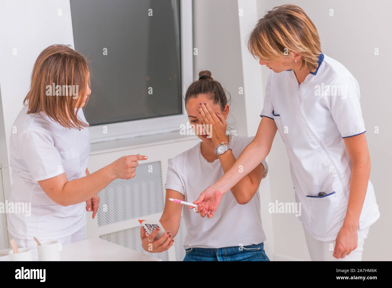 Woman ( girl )reviewing eyesight closing eye with hand. Eye test ...