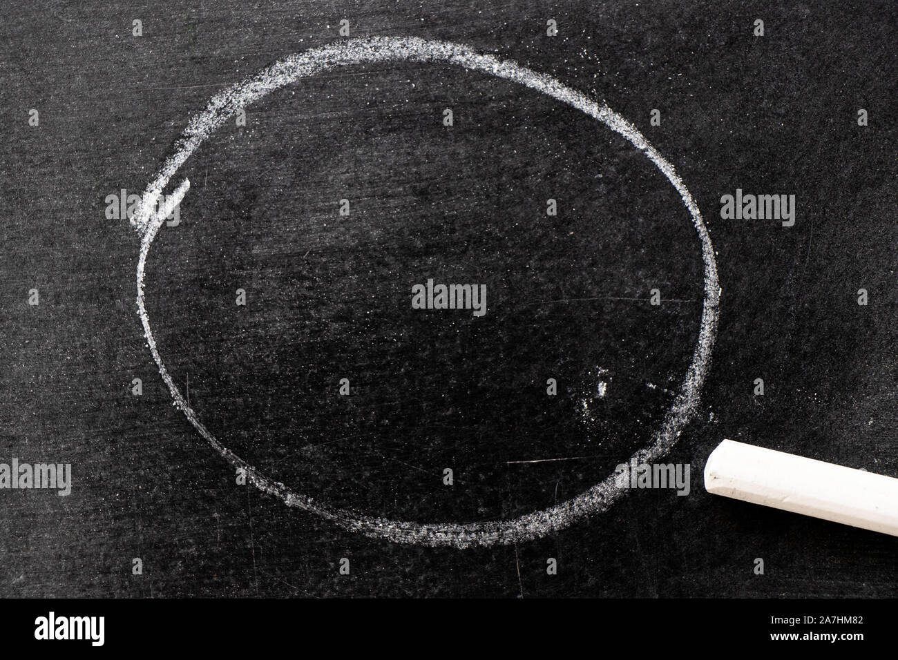 White color chalk hand drawing in circle or round shape and chalk on ...