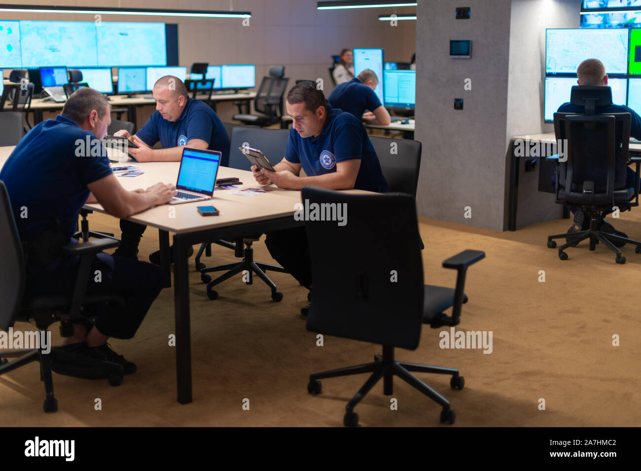 Security guards meeting in the main control data center Stock Photo - Alamy