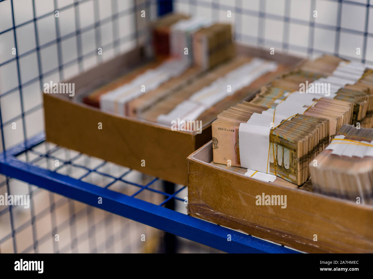 Metal blue cage that is used for storage and trasnportation of boxes ...