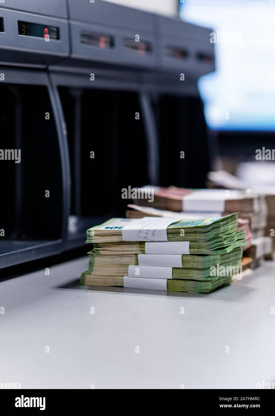 Euro € banknotes stacked and binded together with currency bands in ...