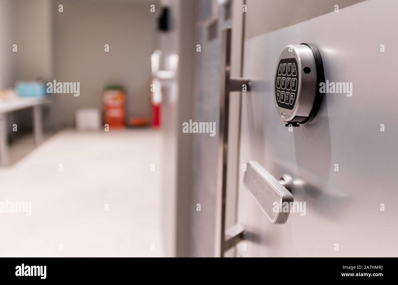 Metal vault door with handle and keypad for authorization and opening ...