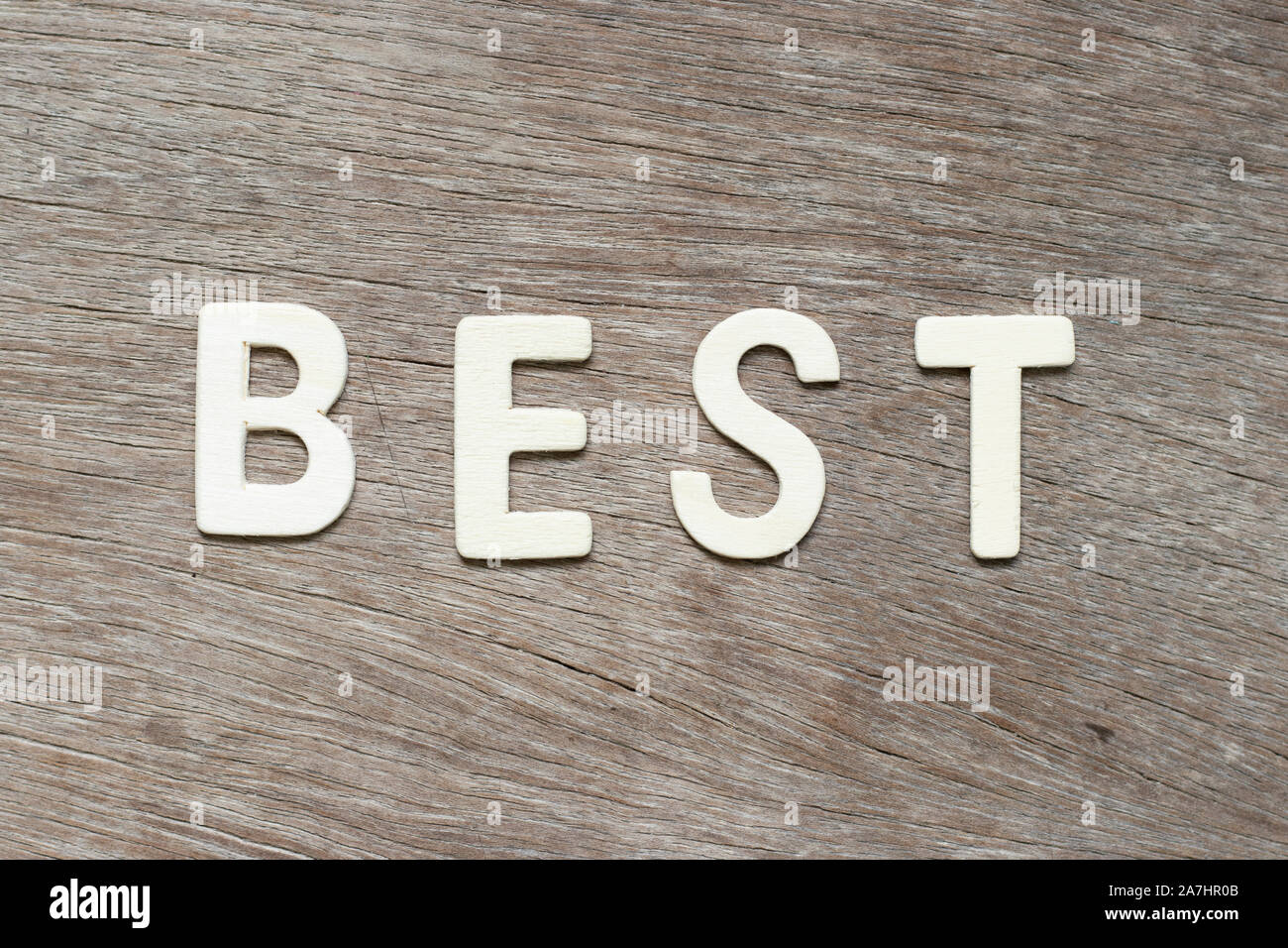 Alphabet letter in word best on wood background Stock Photo - Alamy