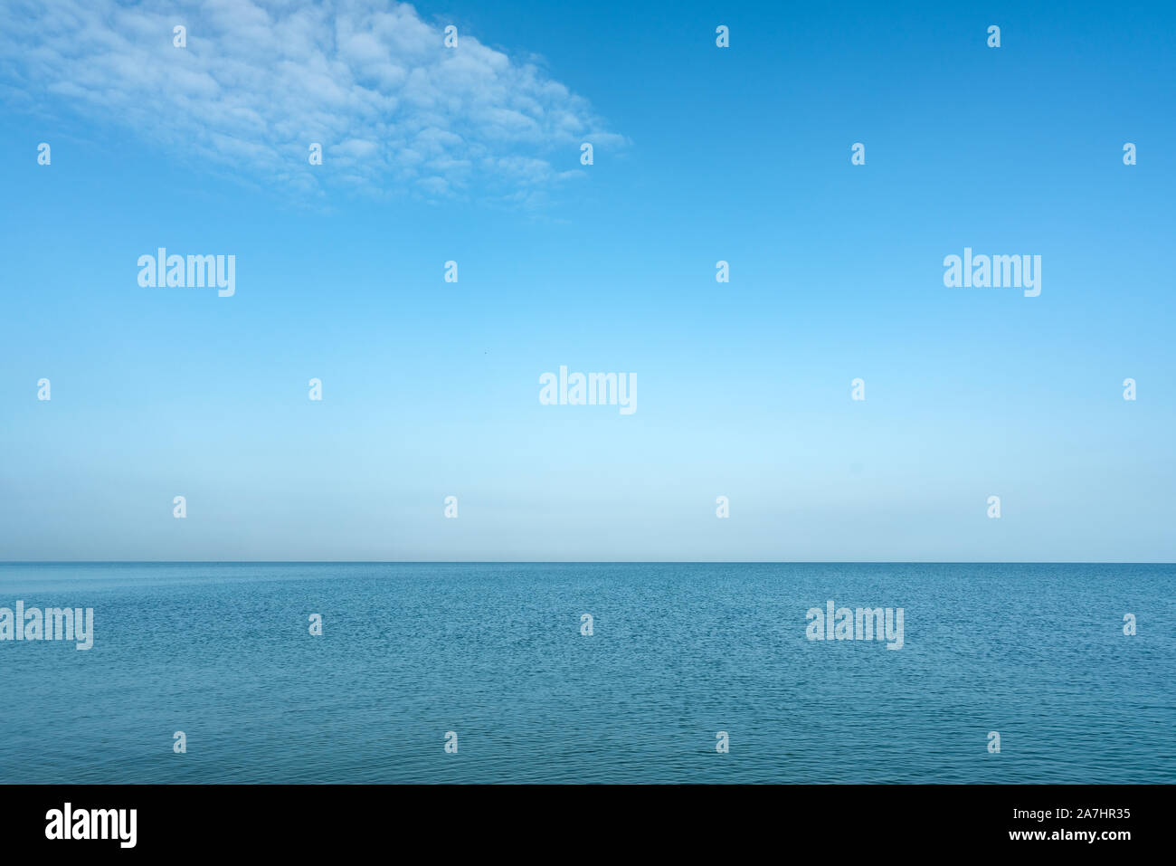 Calm sea and blue sky landscape Stock Photo - Alamy