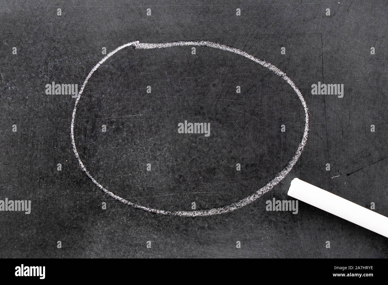 White color chalk hand drawing in circle or round shape and chalk on ...