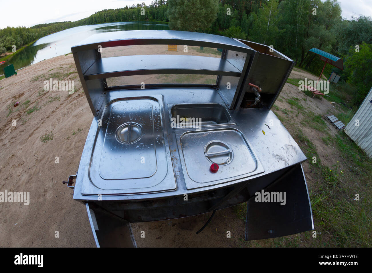 Small outdoor kitchen. Cooking place in forest Stock Photo - Alamy