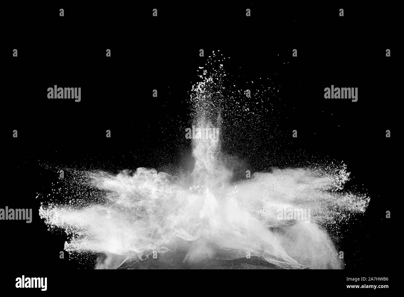Freeze motion of white dust particles splash on black background.White ...
