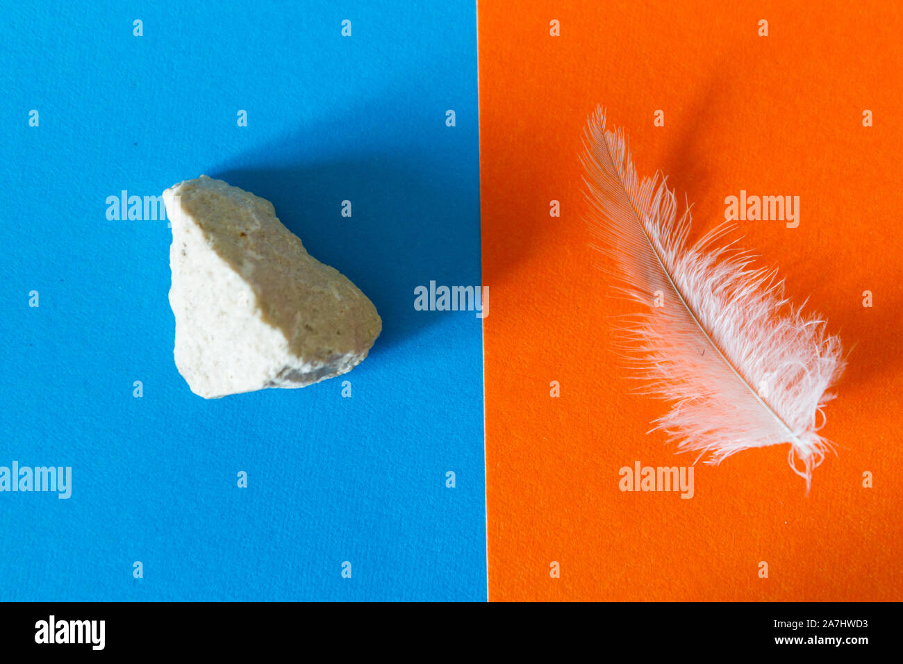 Balance scale feather hi-res stock photography and images - Alamy