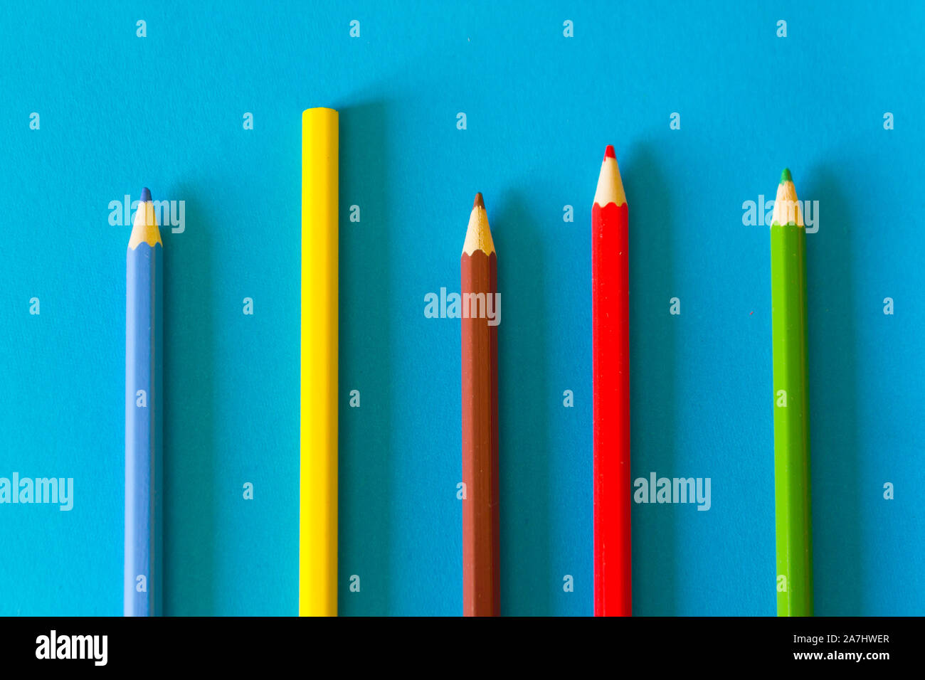 Group of pencils. One is different. Unique concept Stock Photo - Alamy