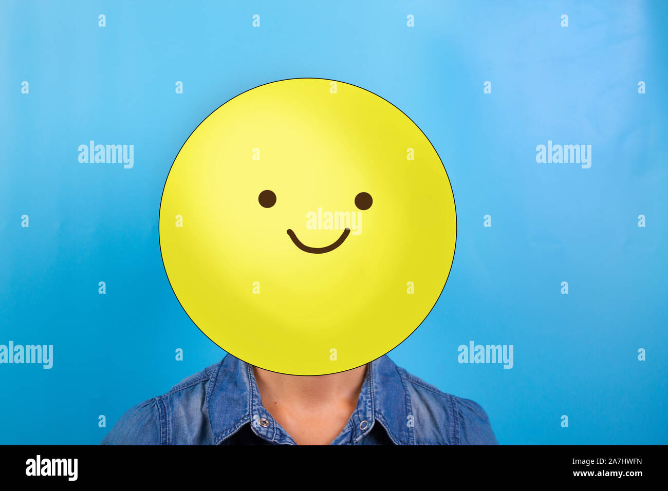 Unrecognizable woman with happy smiley instead of face Stock Photo - Alamy