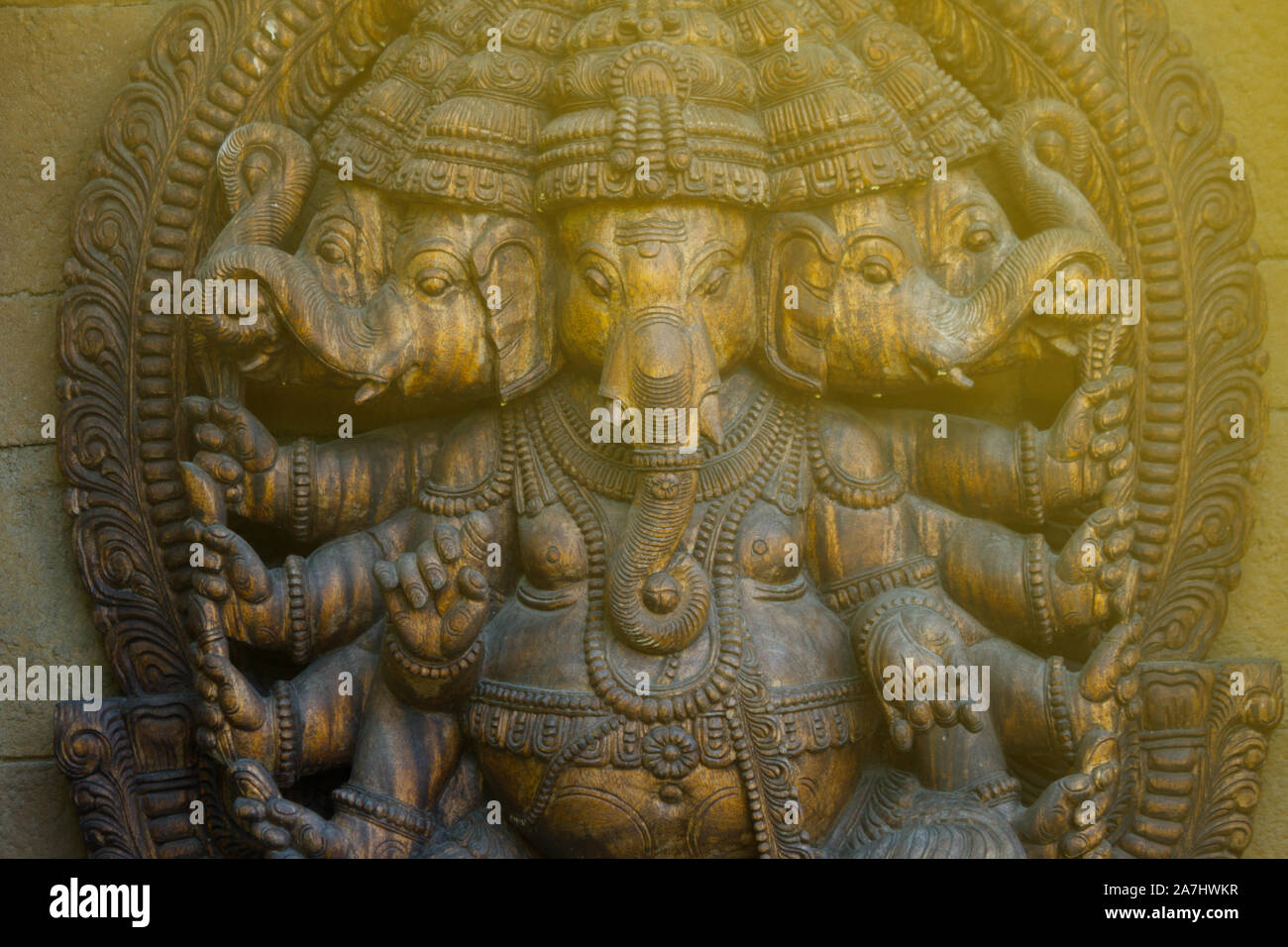 Bronze colored statue of indian god Ganesh Stock Photo - Alamy