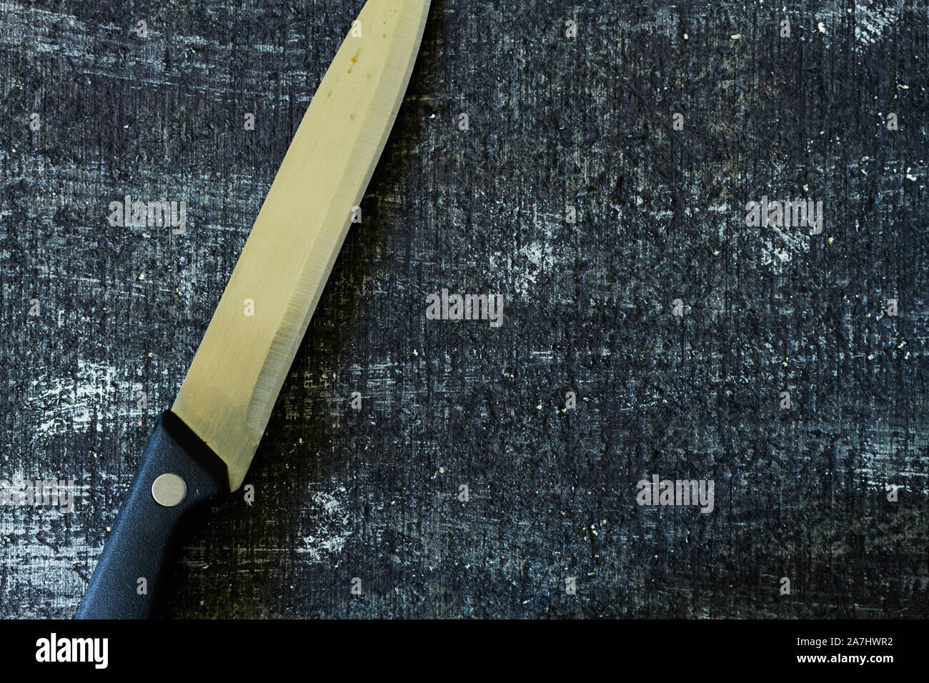 Kitchen knife on black background with copy space Stock Photo - Alamy