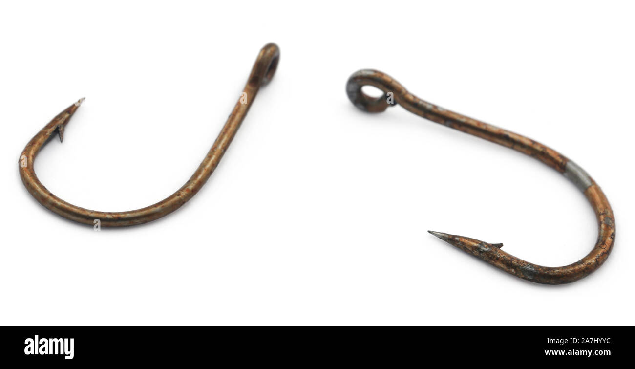 Fishing hooks isolated over white background Stock Photo - Alamy