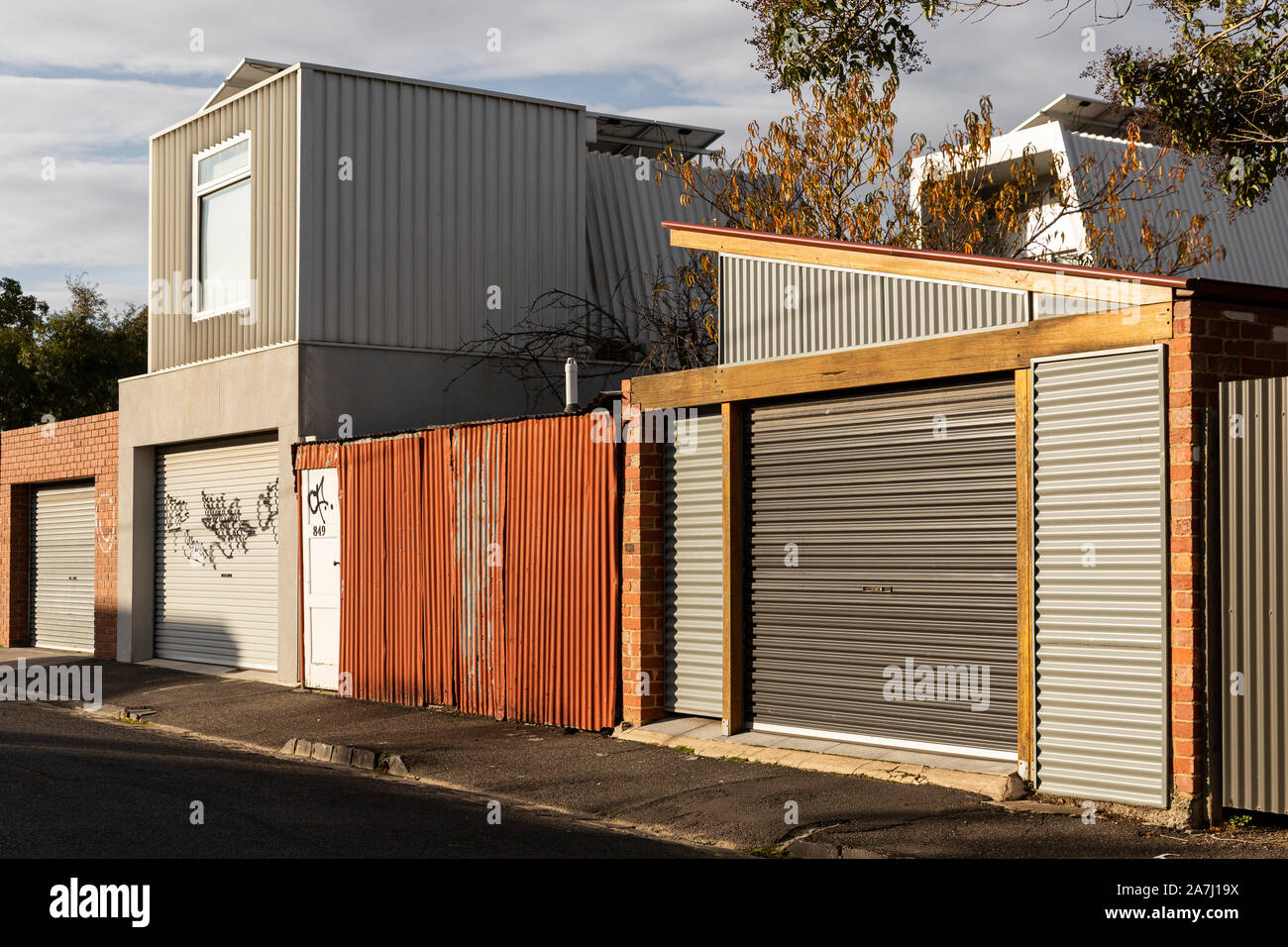 Modern back alley way with earthy toned colors Stock Photo - Alamy
