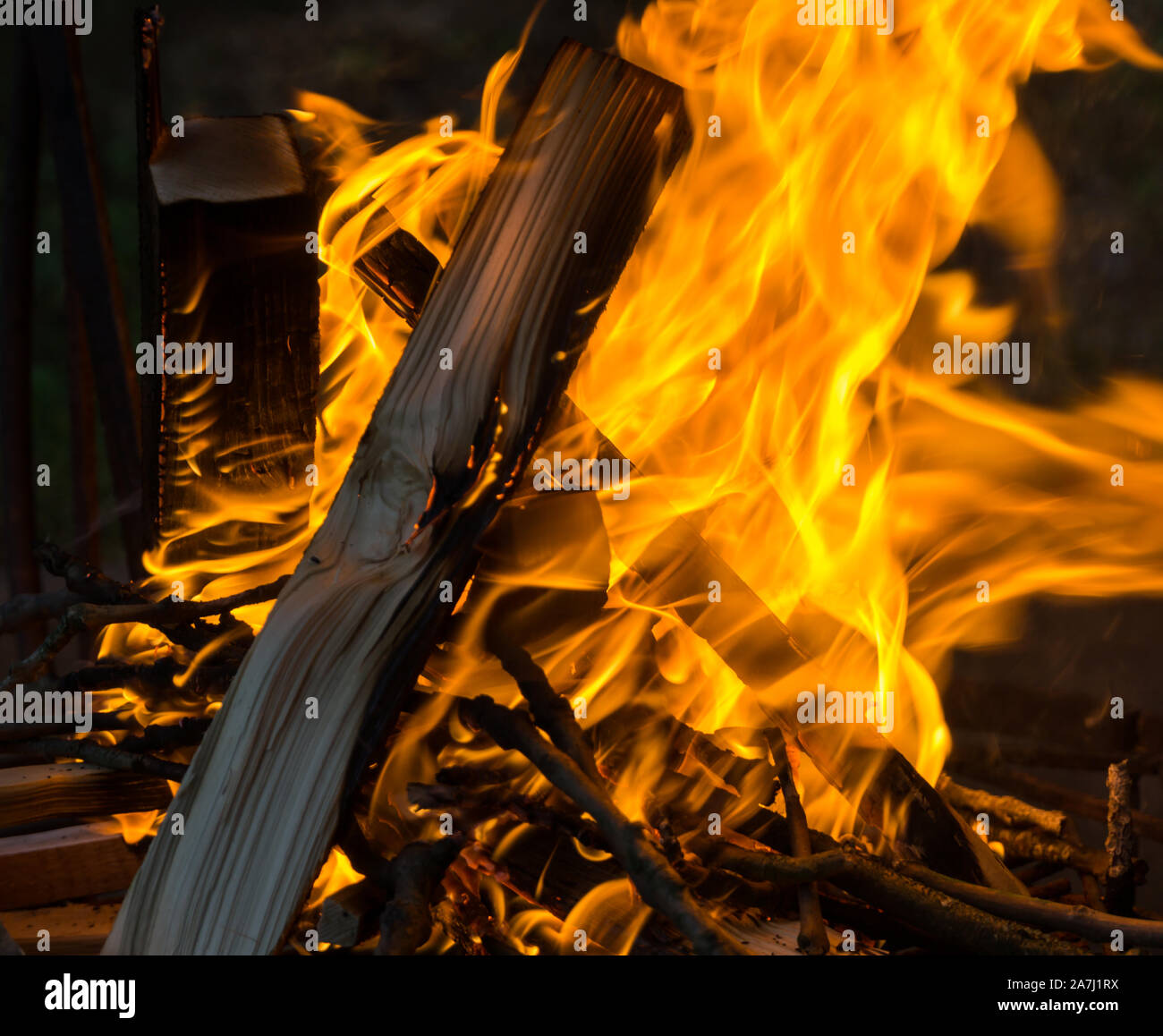 Fire flames on dark background of a natural wood fire Stock Photo - Alamy