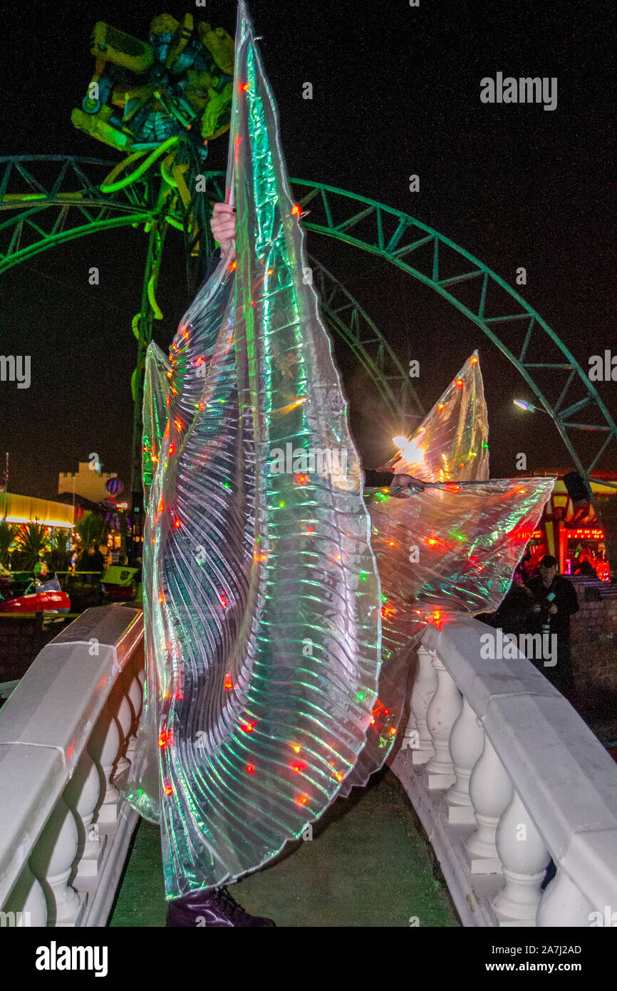 Wings over water LED wispy display elegant skeletal figure at the Day ...
