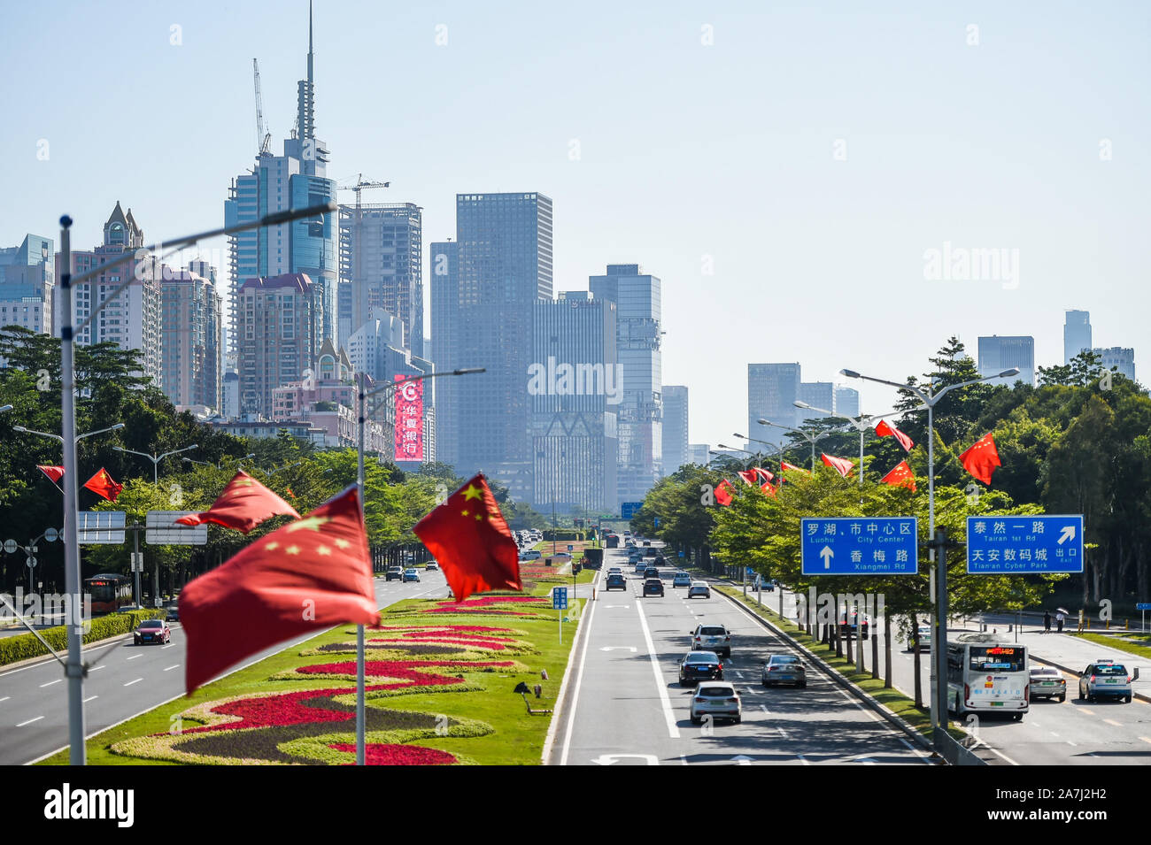 Red Chinese flags set up on a main road to embrace the 70th anniversary ...