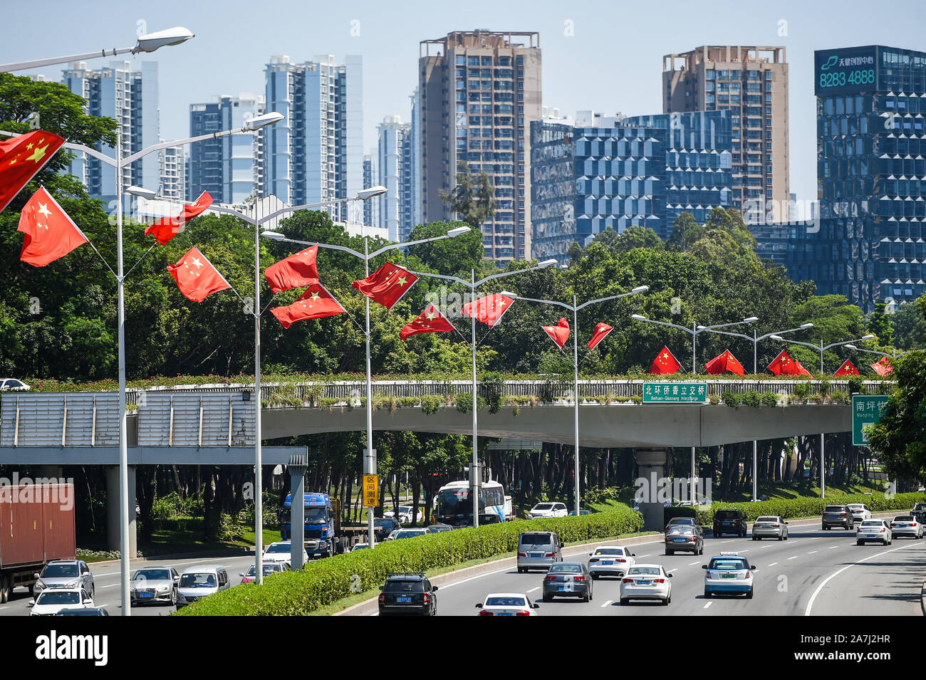 Red Chinese flags set up on a main road to embrace the 70th anniversary ...