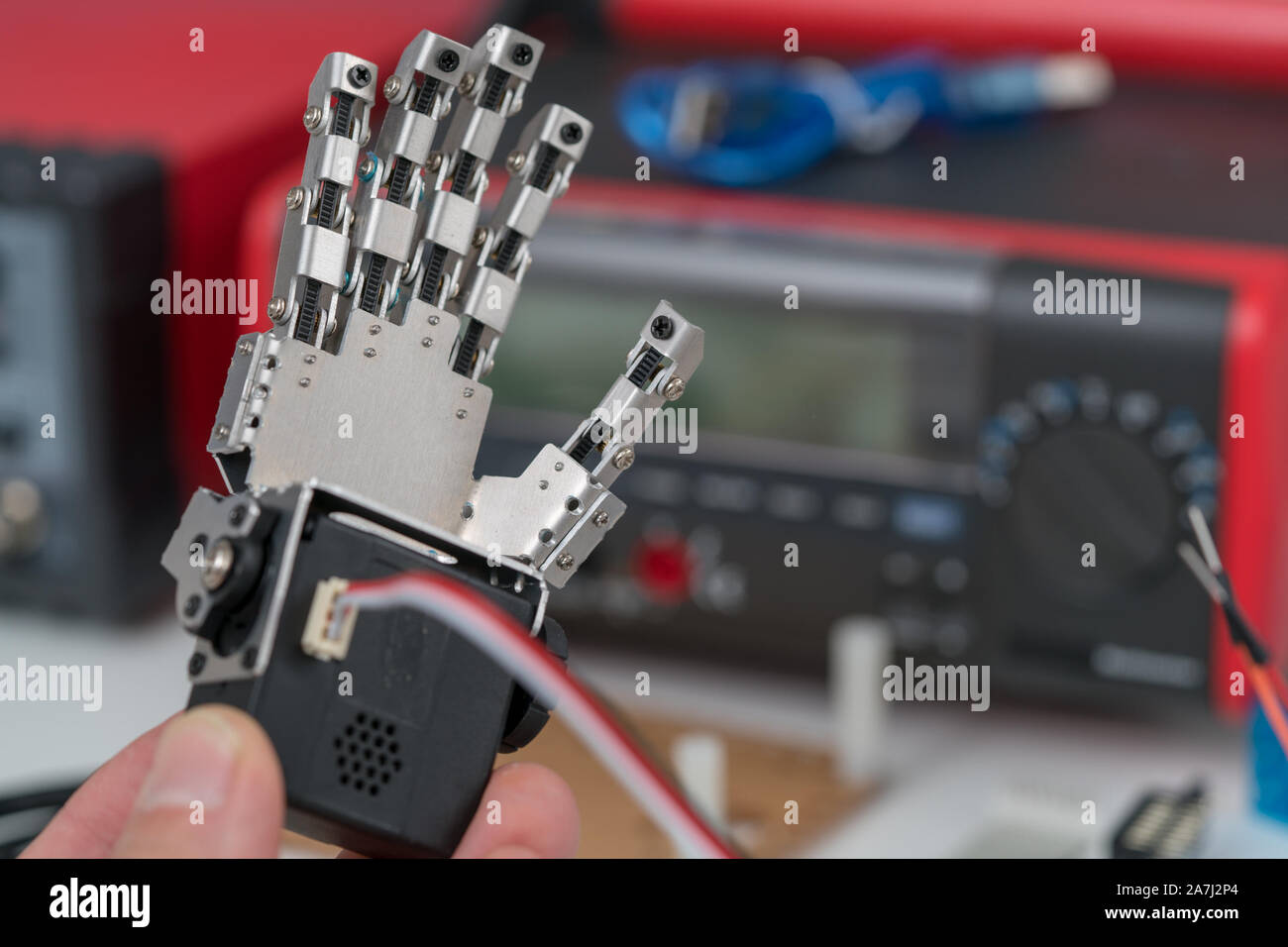 Mechanical model of human palm. Robot arm Stock Photo - Alamy