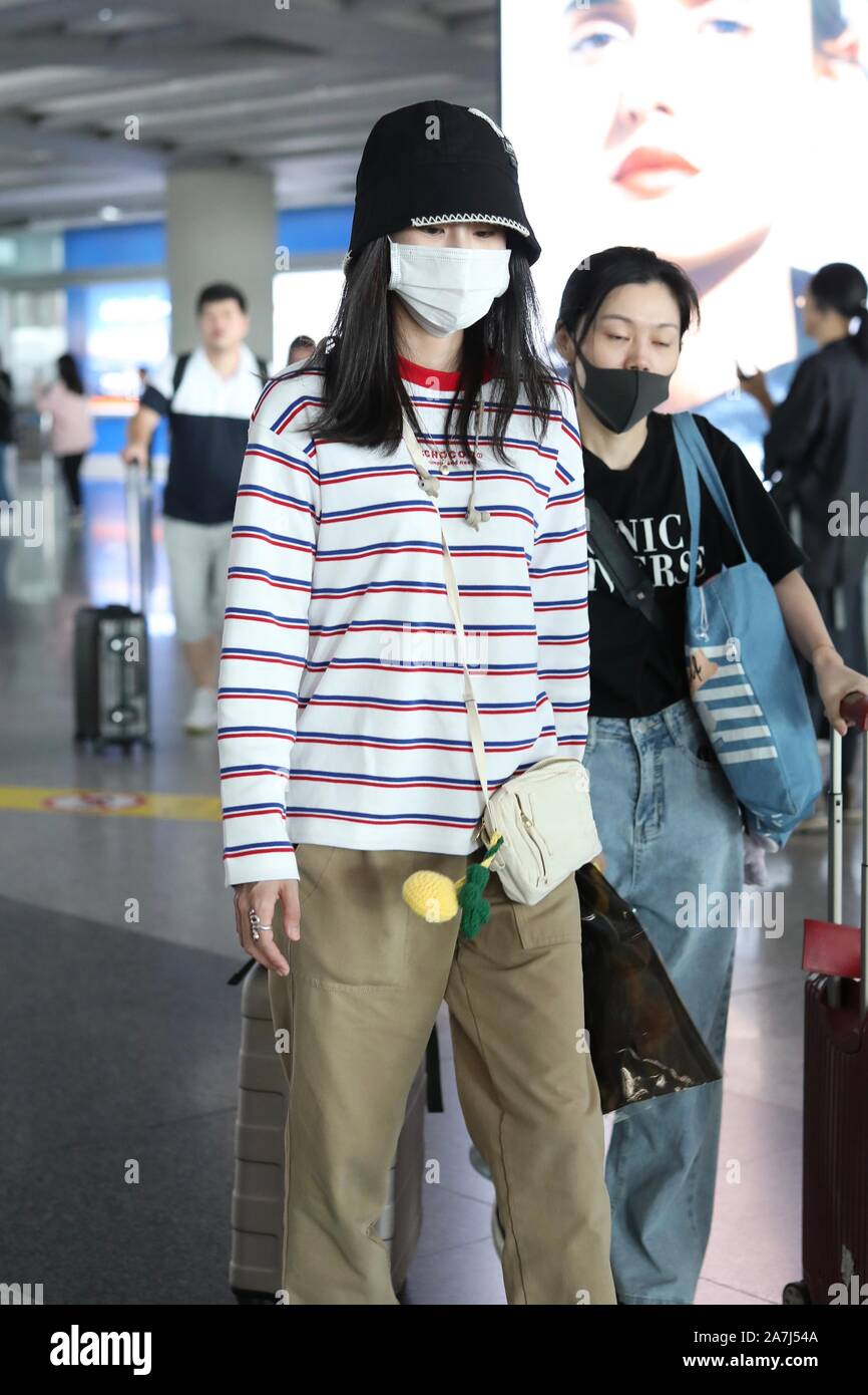 Chinese singer Zhang Bichen or Diamond Zhang arrives at the Beijing ...
