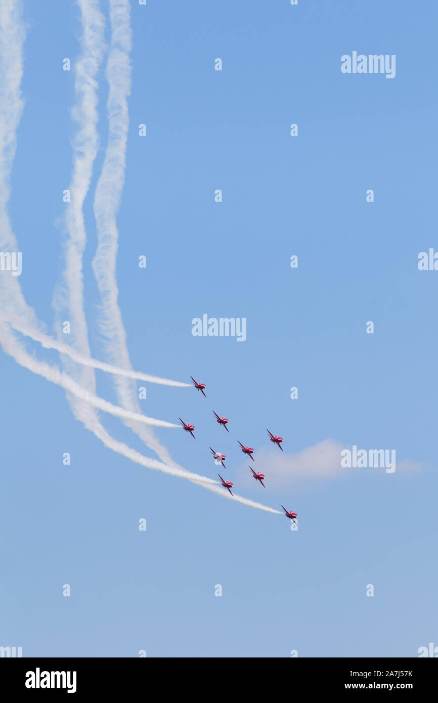 RAF aerobatics display team the Red Arrows give an air display Stock ...
