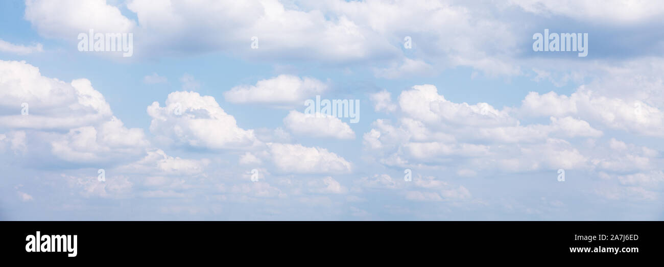 panorama with blue sky and white cumulus clouds Stock Photo - Alamy
