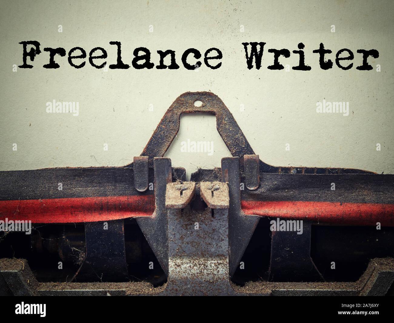 Close up of old typewriter covered with dust with freelance writers ...